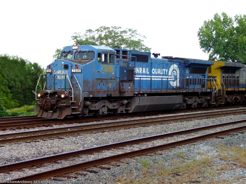 CSX C40-8W #7326, leading CSX autorack unit train Q220-20, about to cross Elm Street